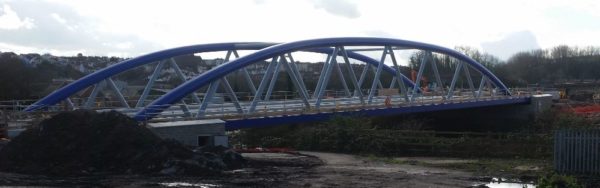 Heavy Duty Pipe Supports - Complex Installation Under a Bridge