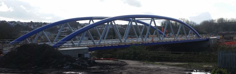 Heavy Duty Pipe Supports - Complex Installation Under a Bridge