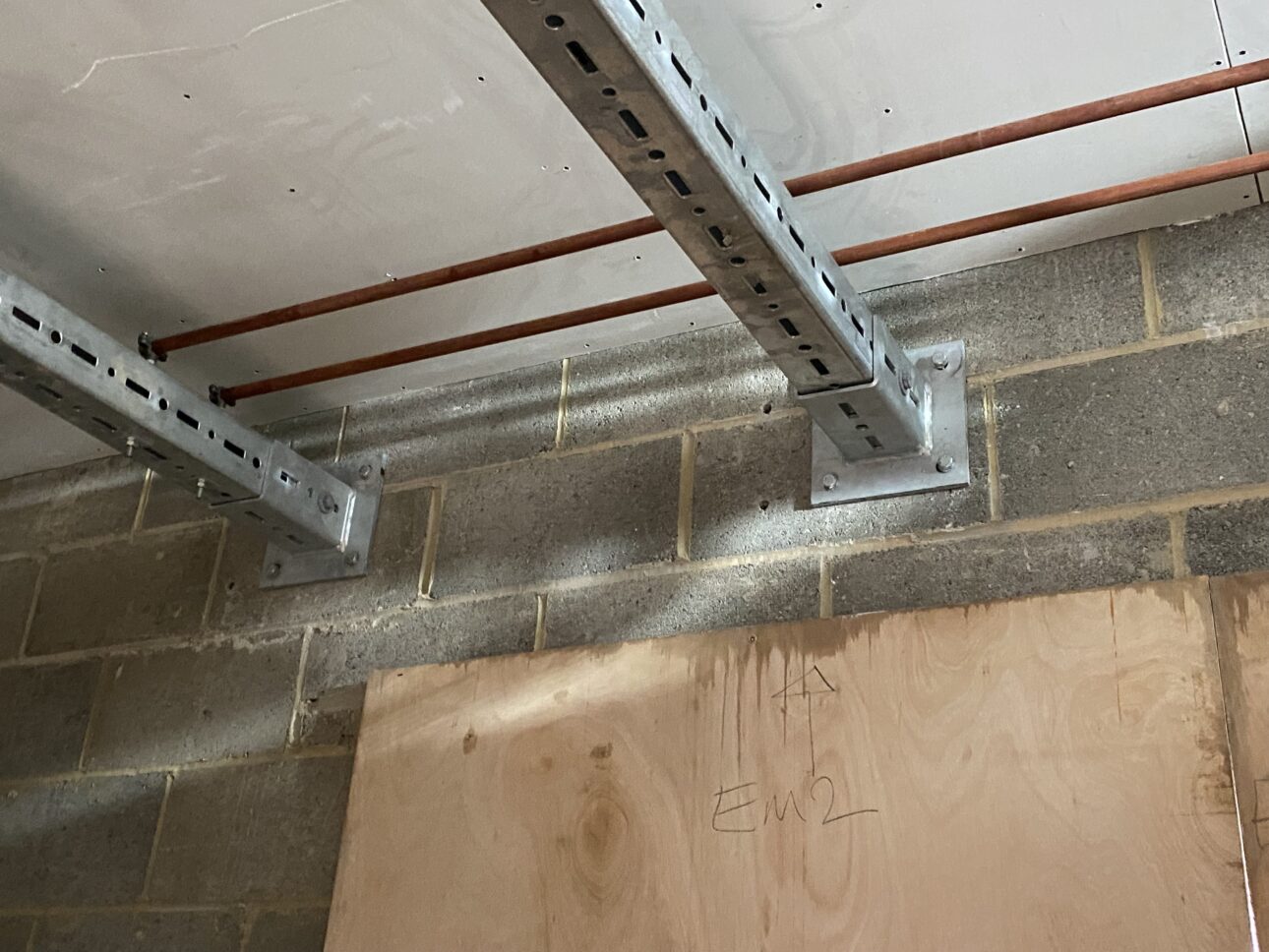 Multi-service bracketry for a hospital M&E renovation