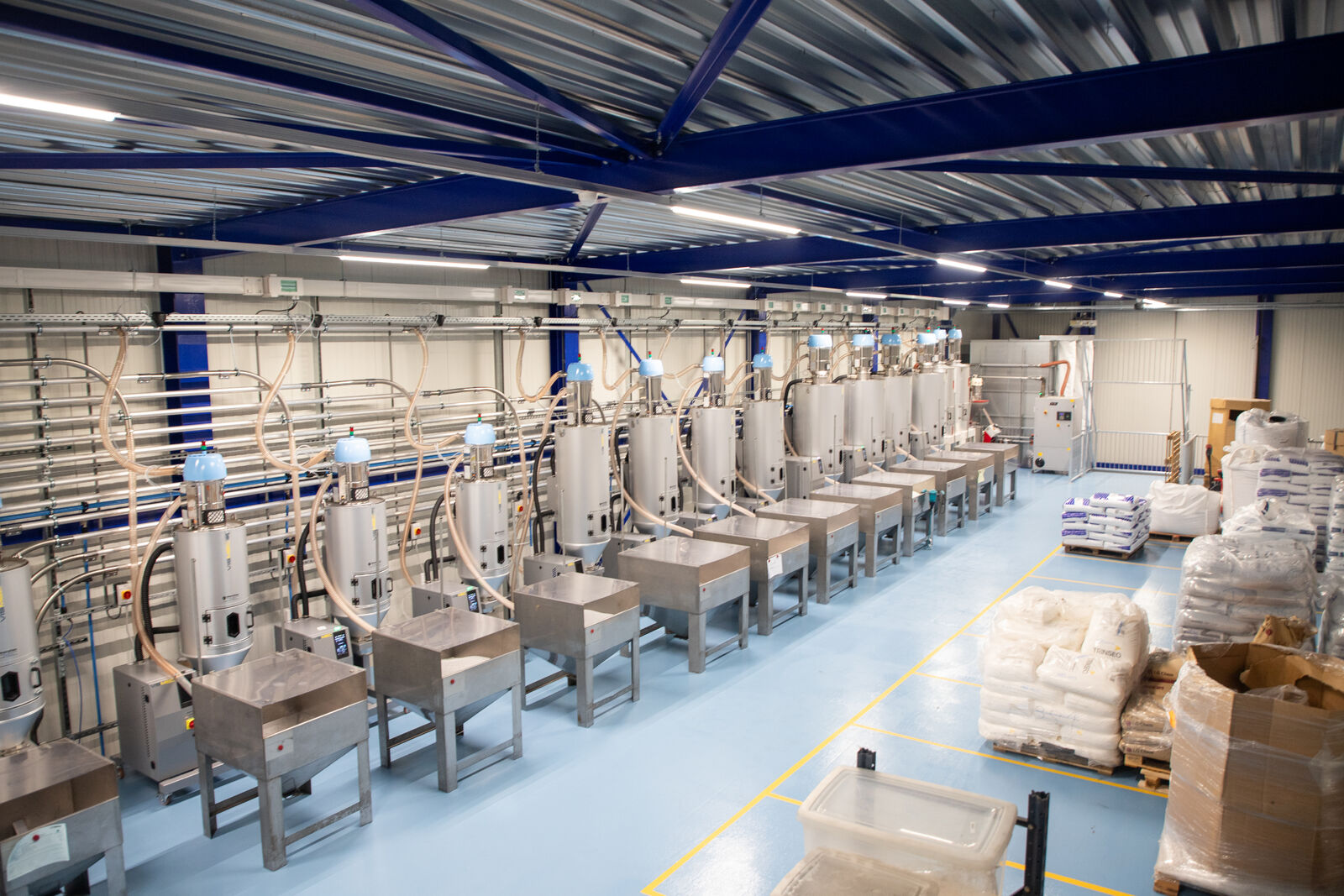 Delivering supports for a complex factory pipework system