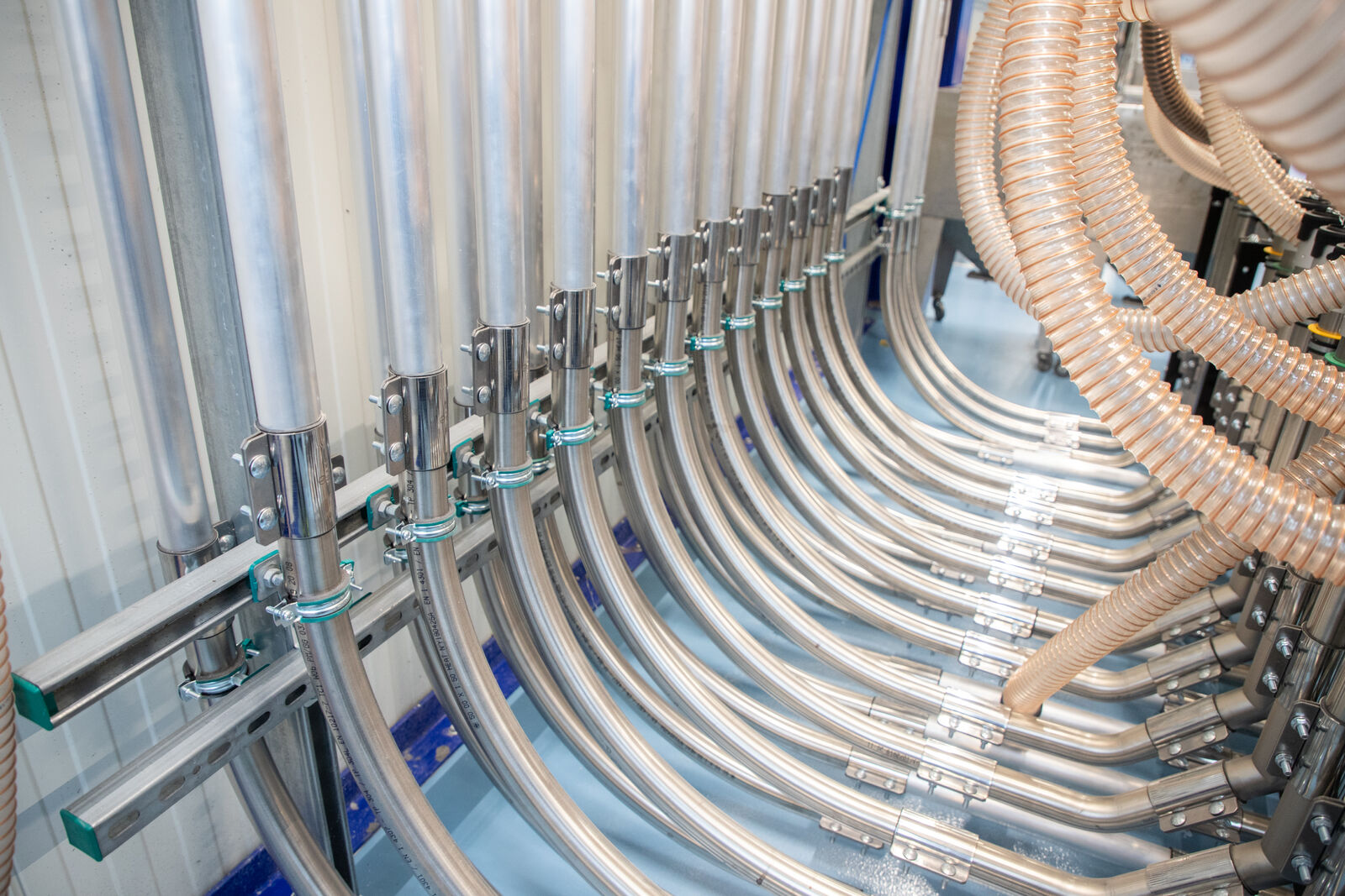 Delivering supports for a complex factory pipework system
