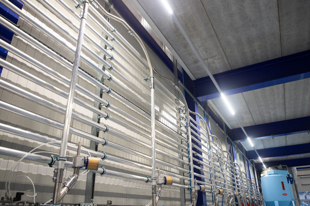 Delivering supports for a complex factory pipework system
